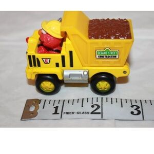 Sesame Street | Toys | Sesame Street Learning Curve 208 Elmo Dump Truck ...